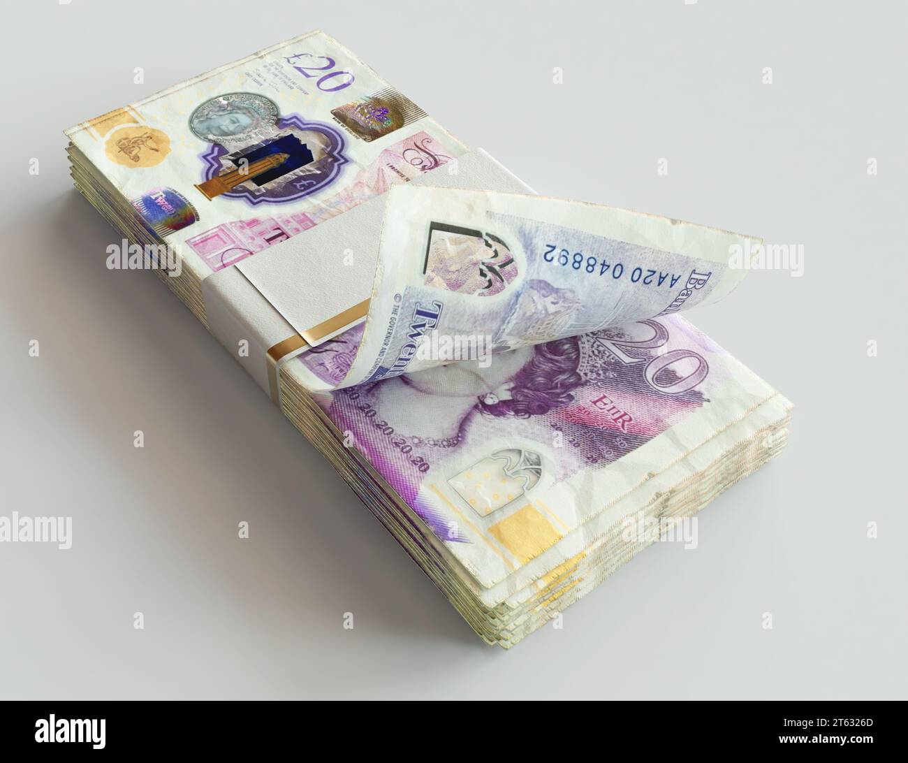 A bundled wad of british pound banknotes on an isolated light ...
