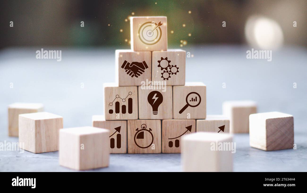Wood cube block stacking with icon. business strategy and action plan ...