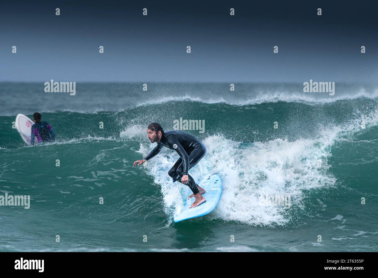 Spectacular surfing action at Fistral in Newquay in Cornwall in the UK ...