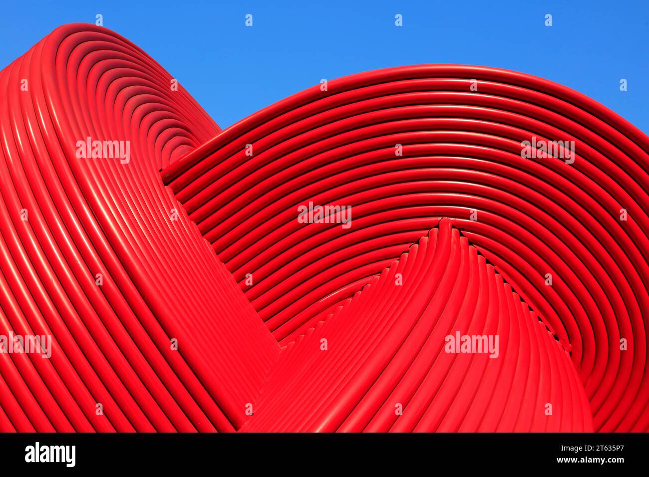 Red steel tube sculpture Stock Photo - Alamy