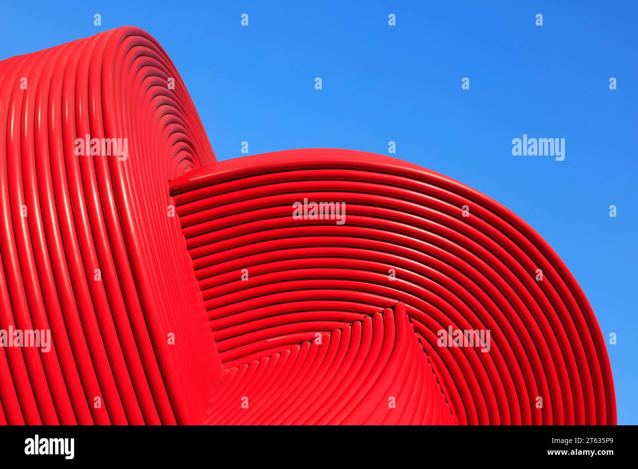 Red steel tube sculpture Stock Photo - Alamy