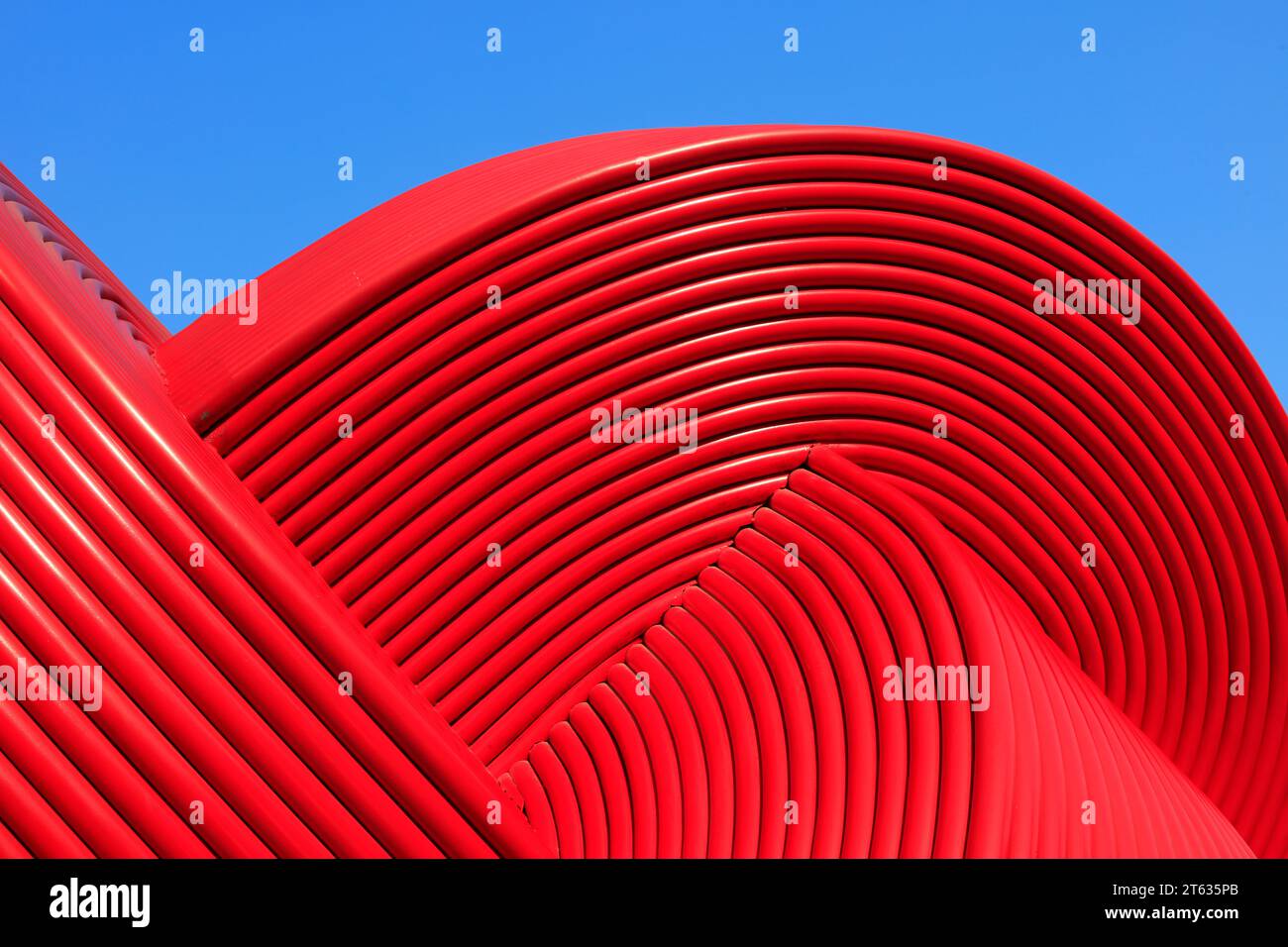 Red steel tube sculpture Stock Photo - Alamy