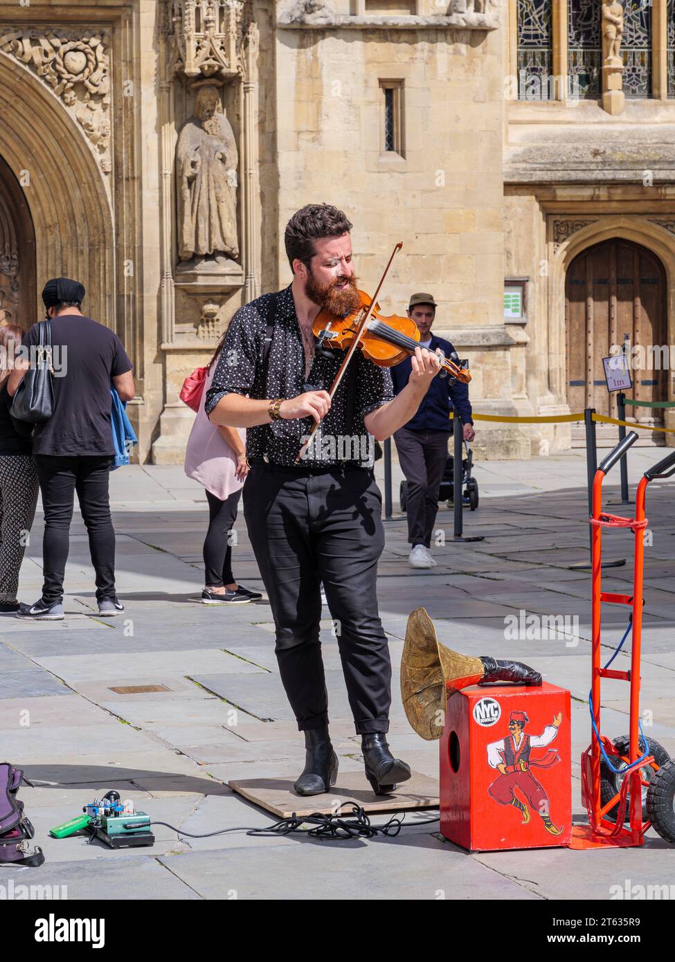 Street musician outside the abbey, Bath, Somerset, England, UK Stock ...