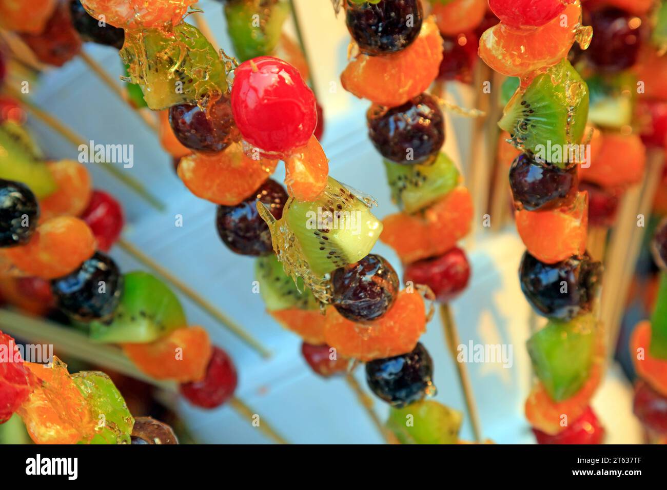 Bingtanghulu Crispy Sugar-Coated Fruit on a Stick Stock Photo - Alamy