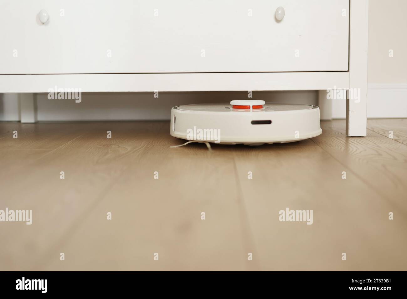 Wireless autonomous robotic vacuum cleaner vacuums with brushes under ...