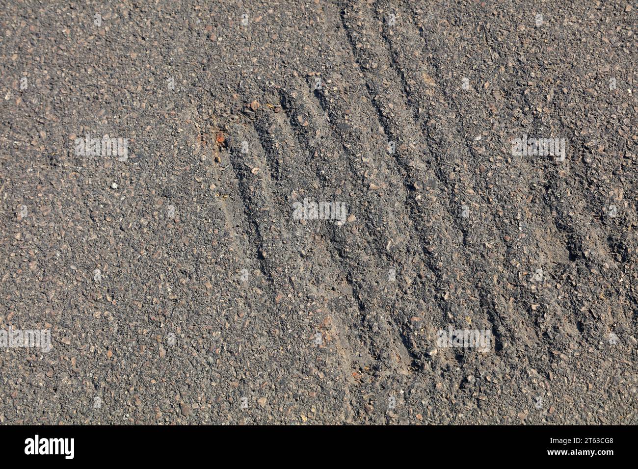 Scratches on asphalt pavement Stock Photo - Alamy