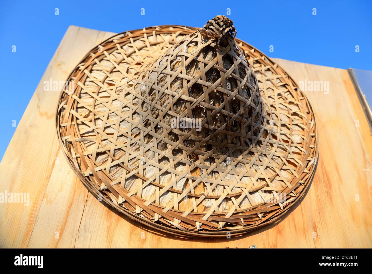 Traditional Chinese style bamboo hat Stock Photo - Alamy