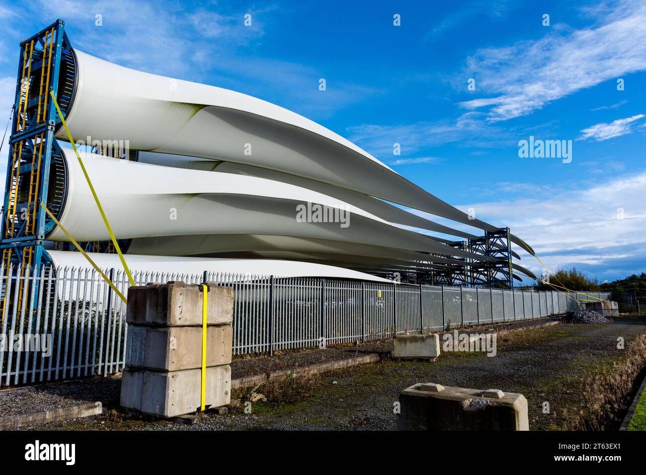 Off shore wind farm turbine blades stacked at Killybegs harbour, County ...