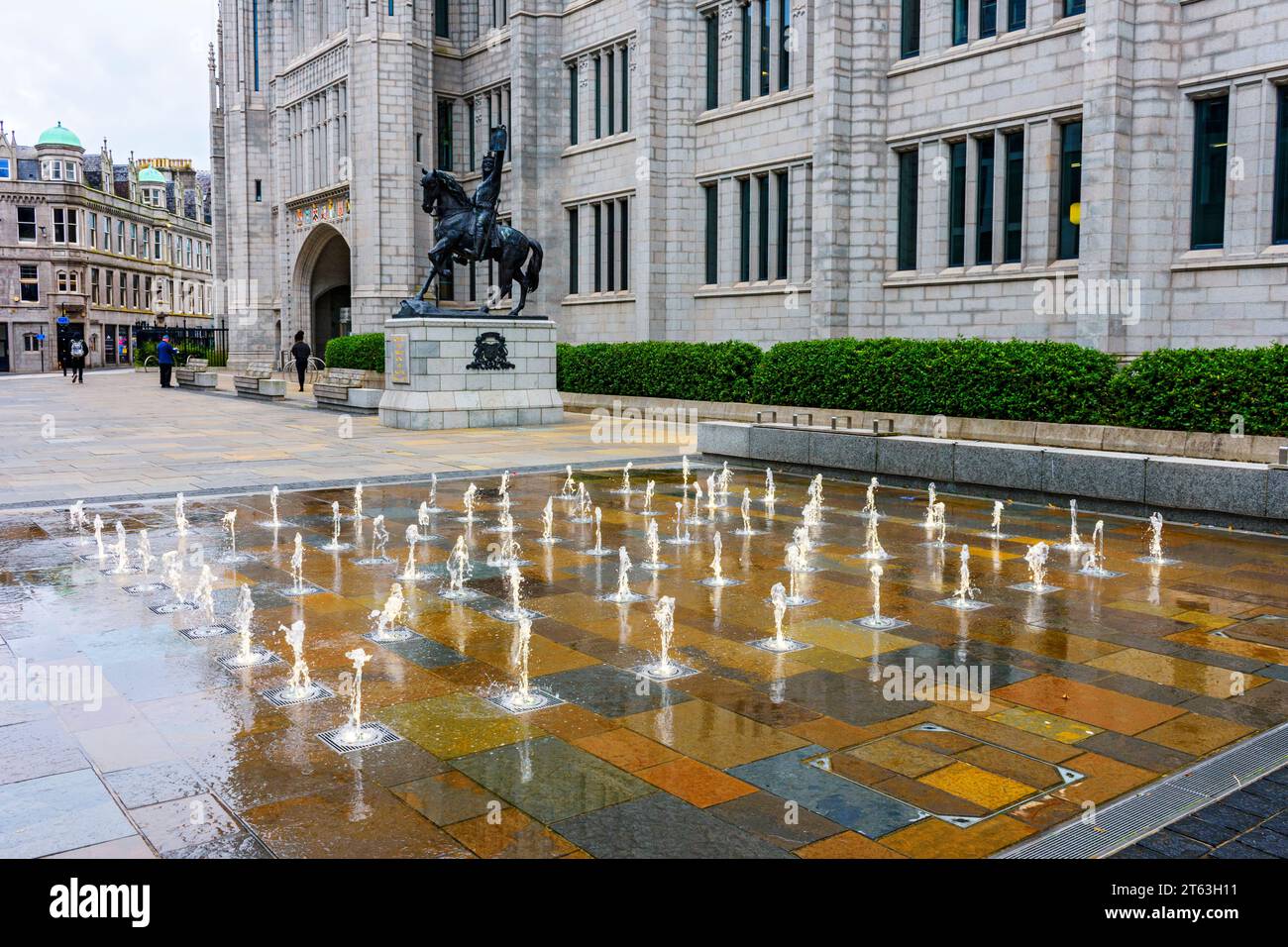 Multiple fountain water feature outside the Marischal College building ...
