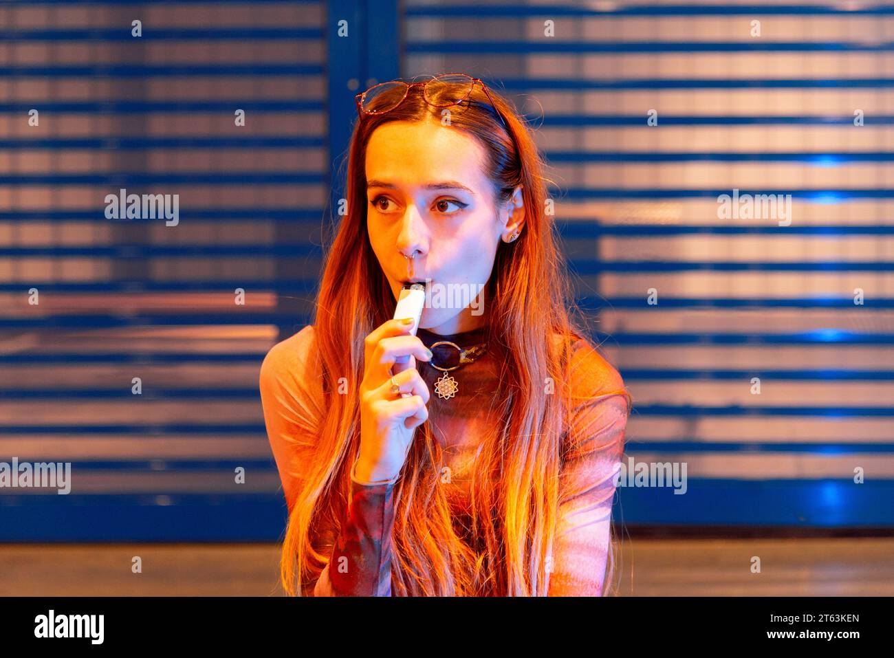 Close up woman lighting cigarette hi-res stock photography and images ...
