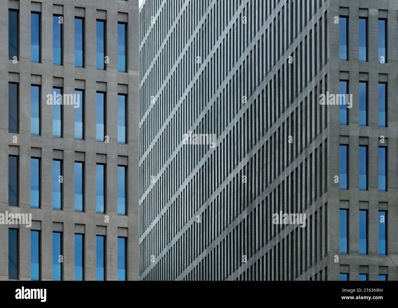 High multistory business buildings with rows of symmetric geometric ...