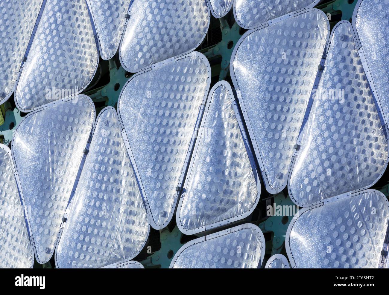 Aerial view of iridescent inflatable objects with dotted patterns ...