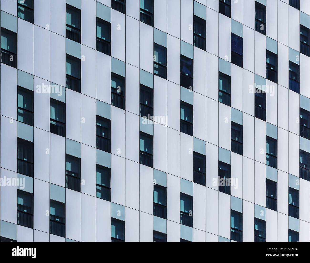 High multistory business buildings with rows of symmetric geometric ...