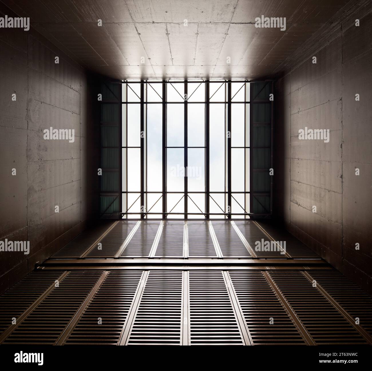 Interior of modern biomedical research center with skylight and walls ...