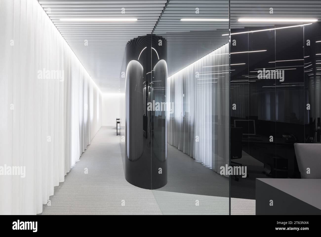 A modern office interior showcasing a pristine white corridor with ...