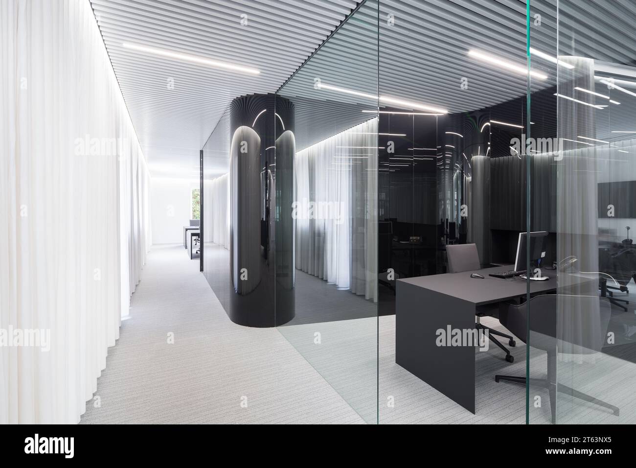 A modern office interior showcasing a pristine white corridor with ...