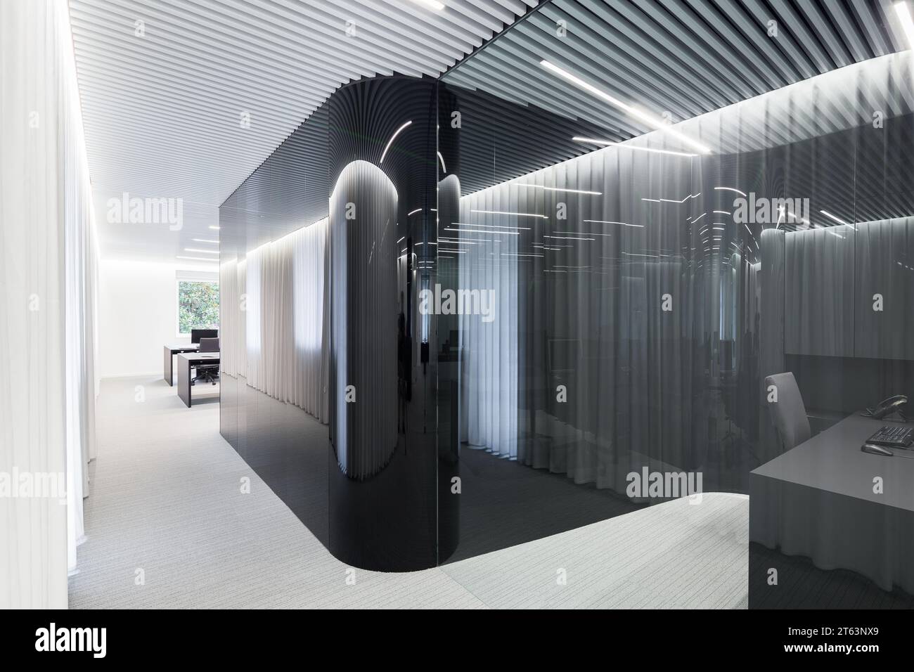 A modern office space showcasing an artistic design with translucent ...