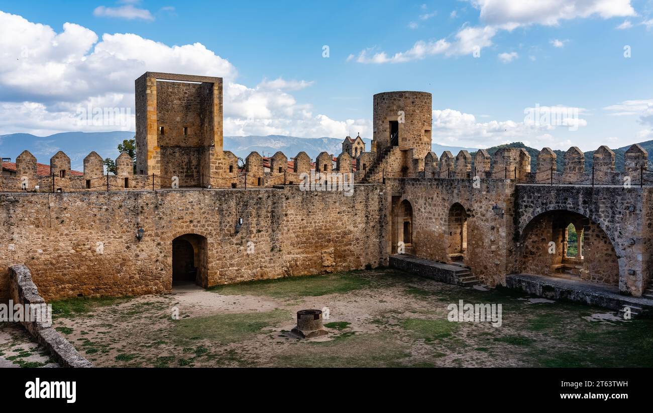 Panoramic view of the medieval castle at the top of the hill in the ...