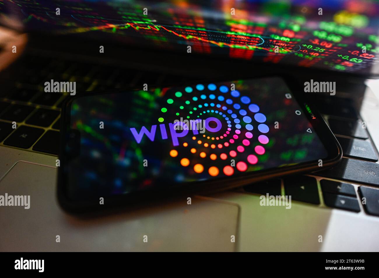 In this photo illustration, a Wipro logo is displayed on a smartphone ...