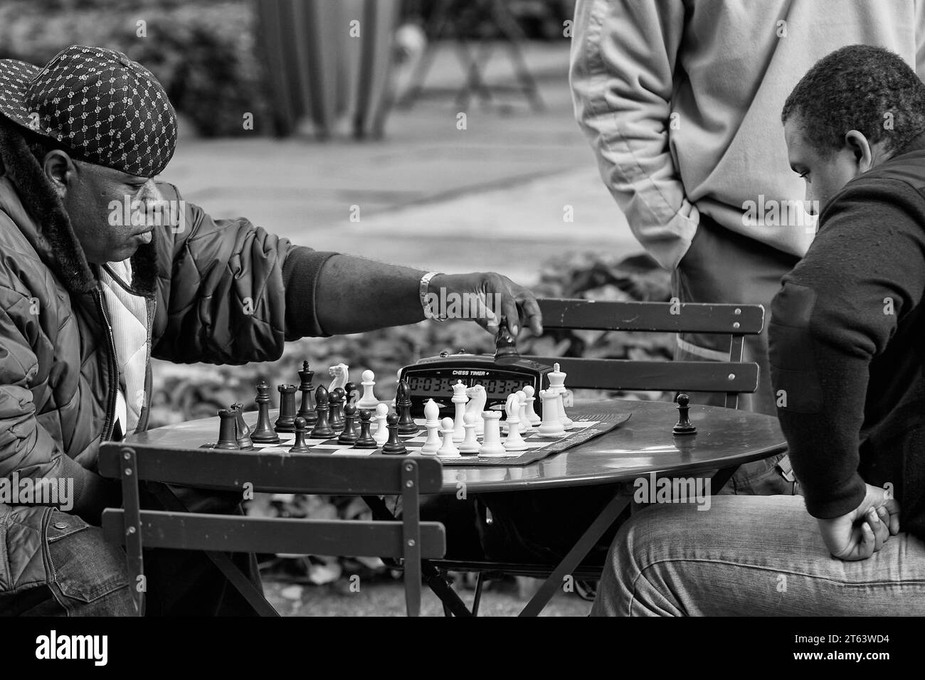 African men playing chess Black and White Stock Photos & Images - Alamy