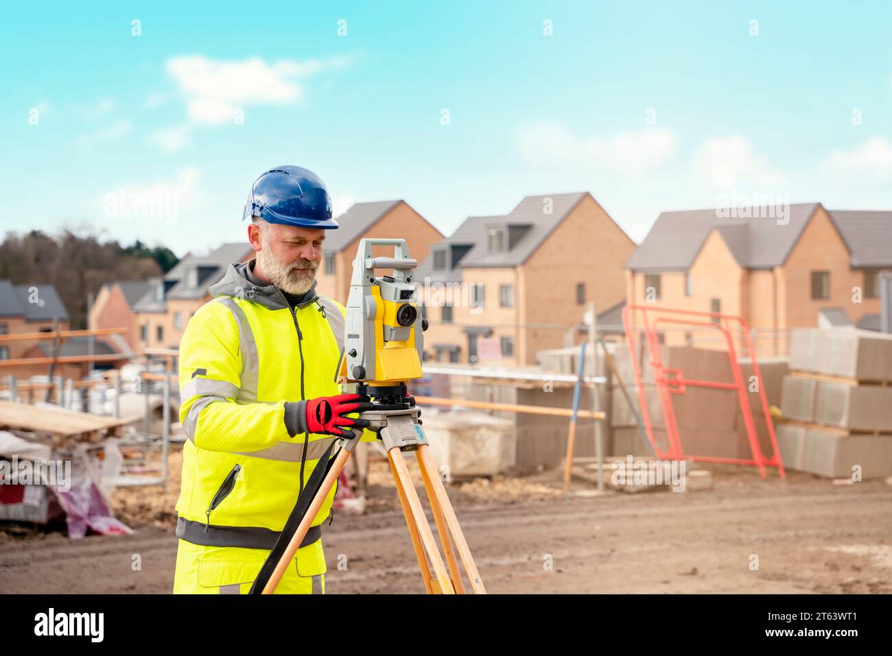 Surveyor builder site engineer with theodolite total station at ...