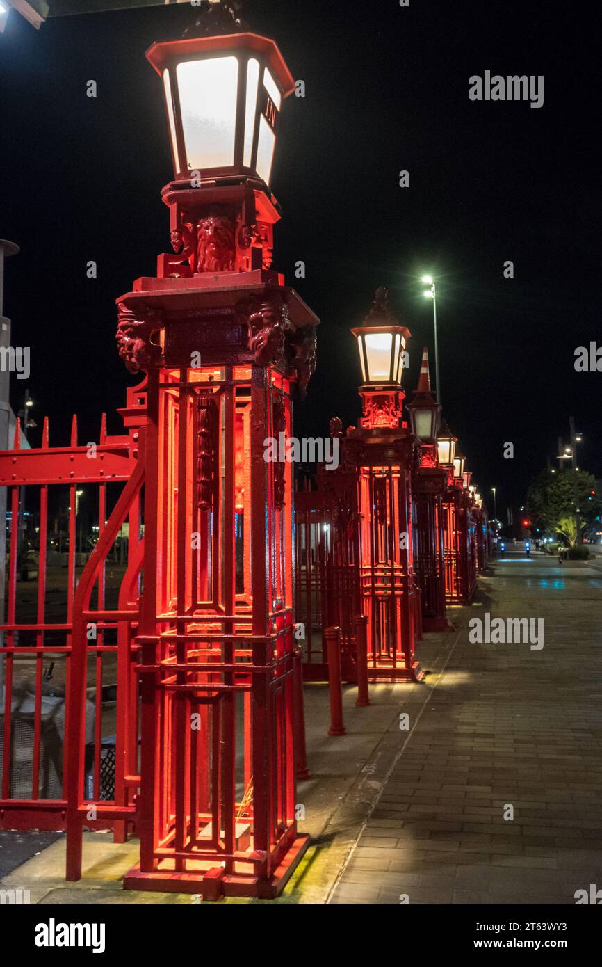 Red wrought iron fence and gates near Historic Ferry Building in ...