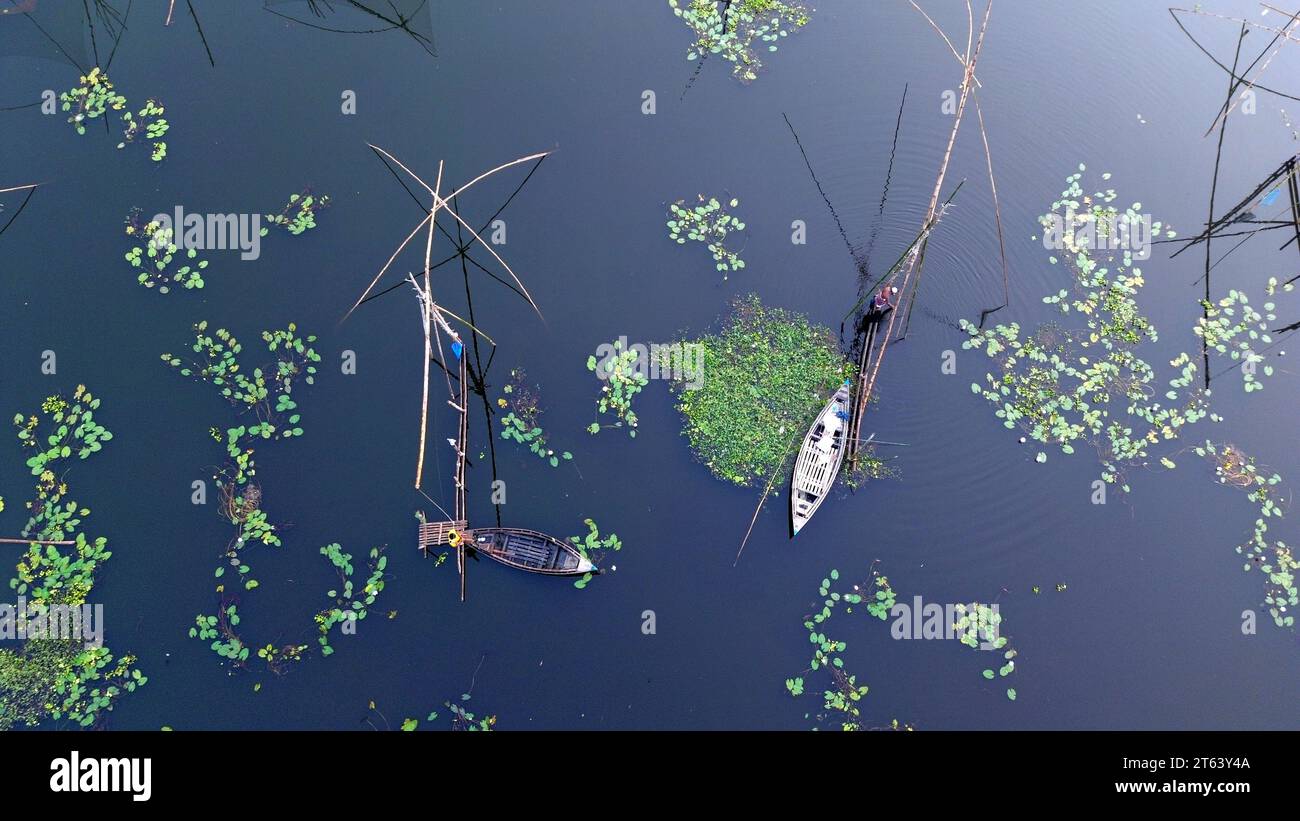 Fishing net and boat Stock Photo - Alamy