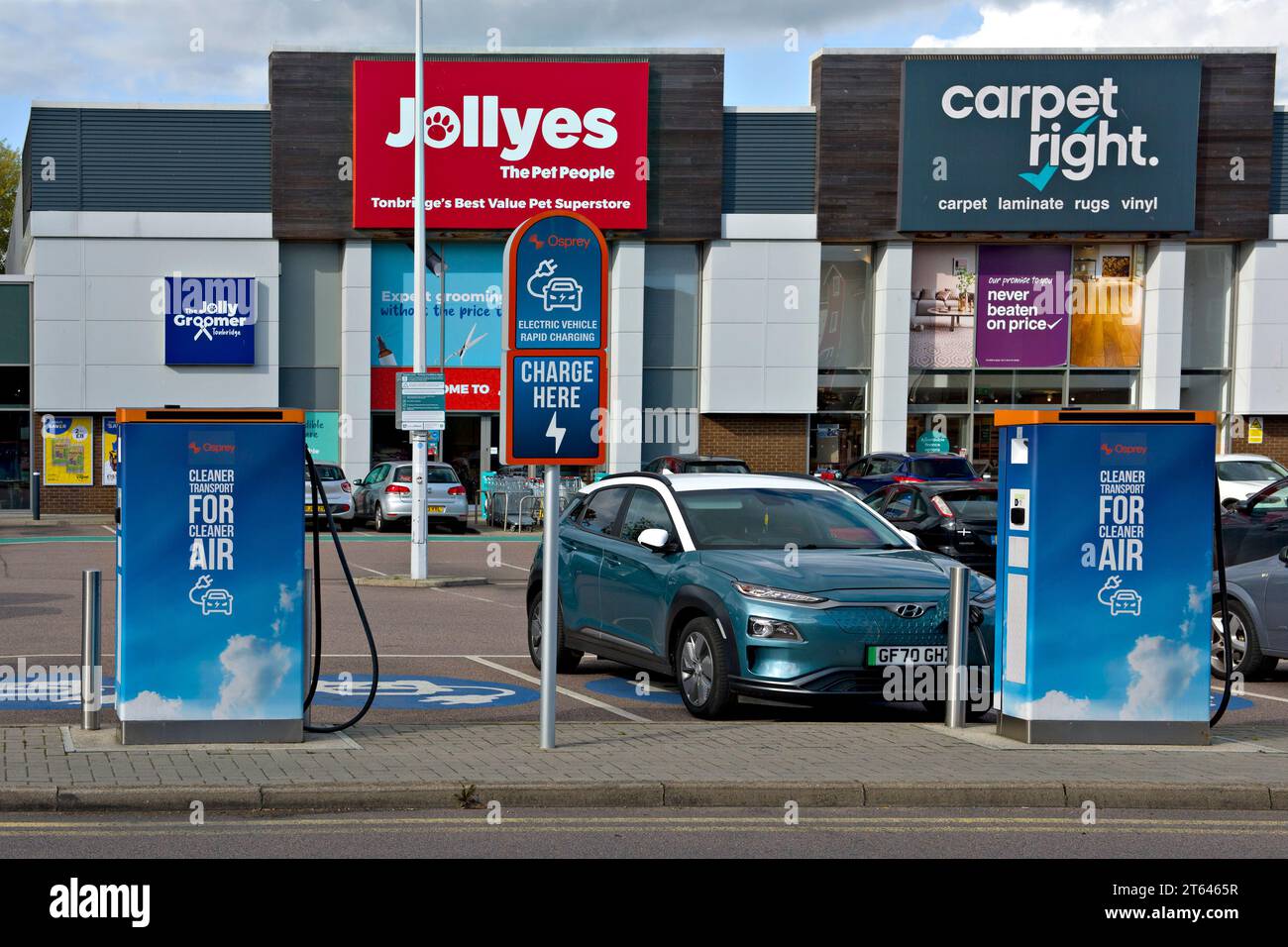 An electric charging point situated a retail centre car park Stock ...