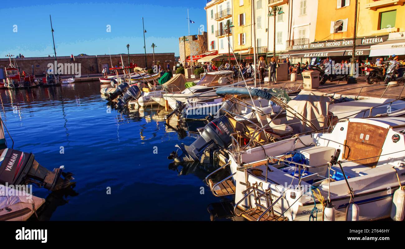 09-24-2015 St Tropez France. Amazing sunset view on motorboats and pier ...