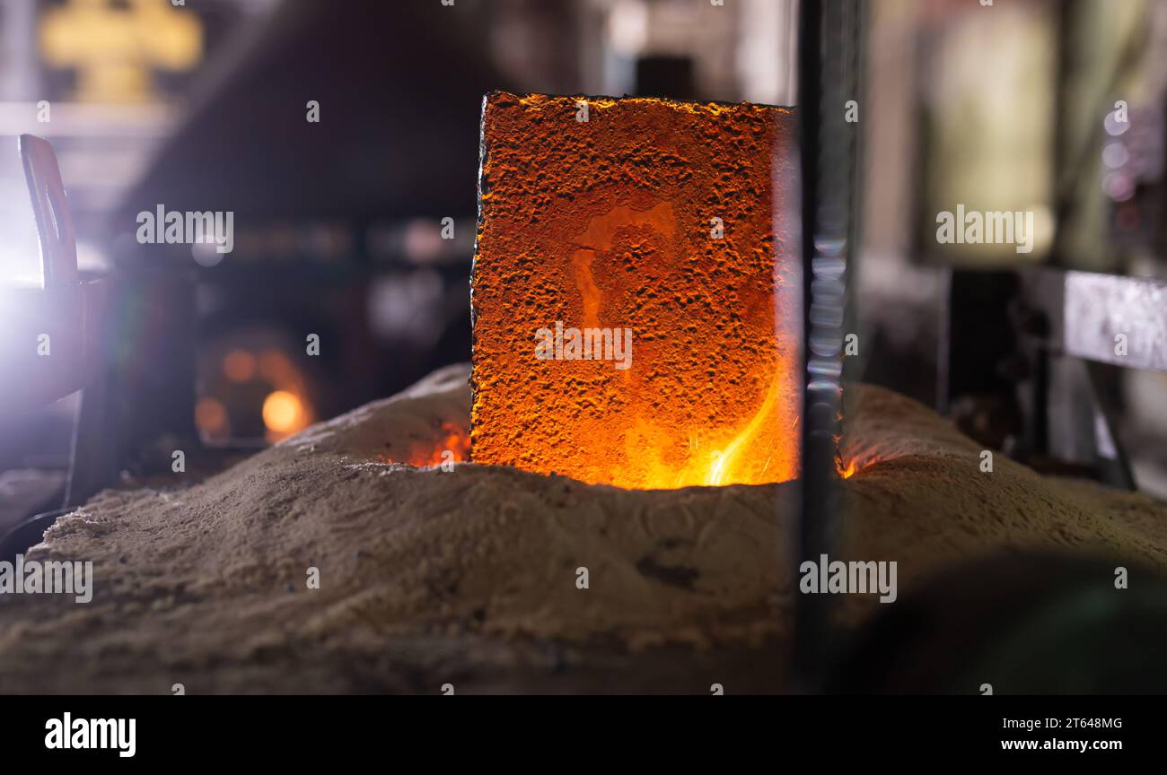 Foundry ferrous metal is melted in an induction furnace of ...