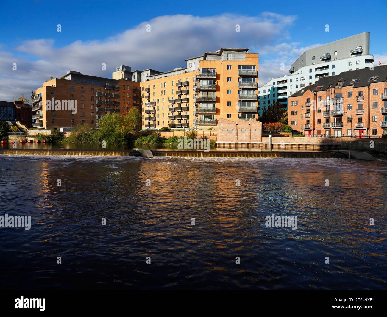 Modern buildings by Leeds Dam on the River Aire at Leeds West Yorkshire ...