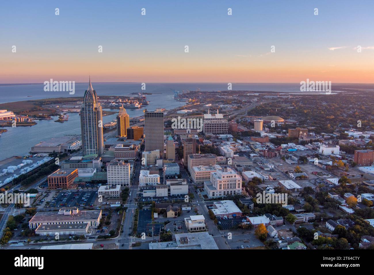 Drone shot of the downtown Mobile, Alabama waterfront skyline at sunset ...