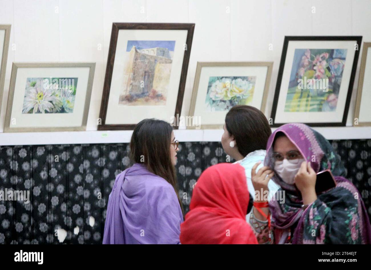 Visitors take keen interest in art painting during Art Exhibition of the First Women Literature ...
