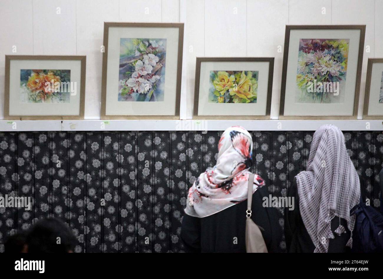 Visitors take keen interest in art painting during Art Exhibition of ...