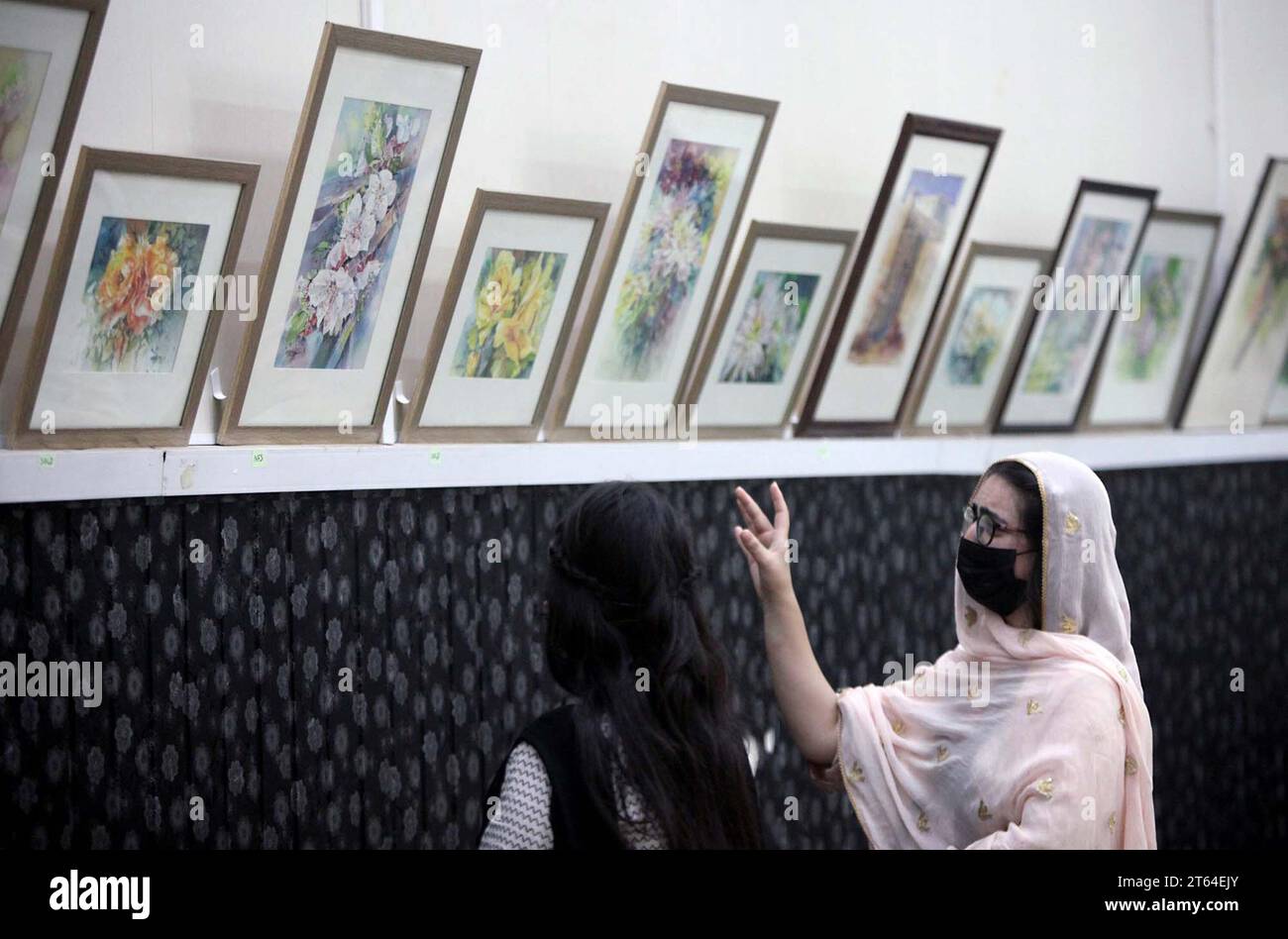 Visitors take keen interest in art painting during Art Exhibition of ...