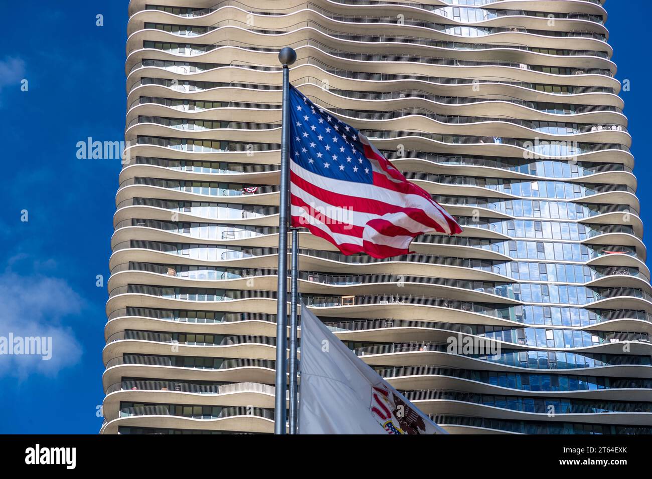 American flag with the Radisson Blue Aqua Hotel on the Chicago Loop ...