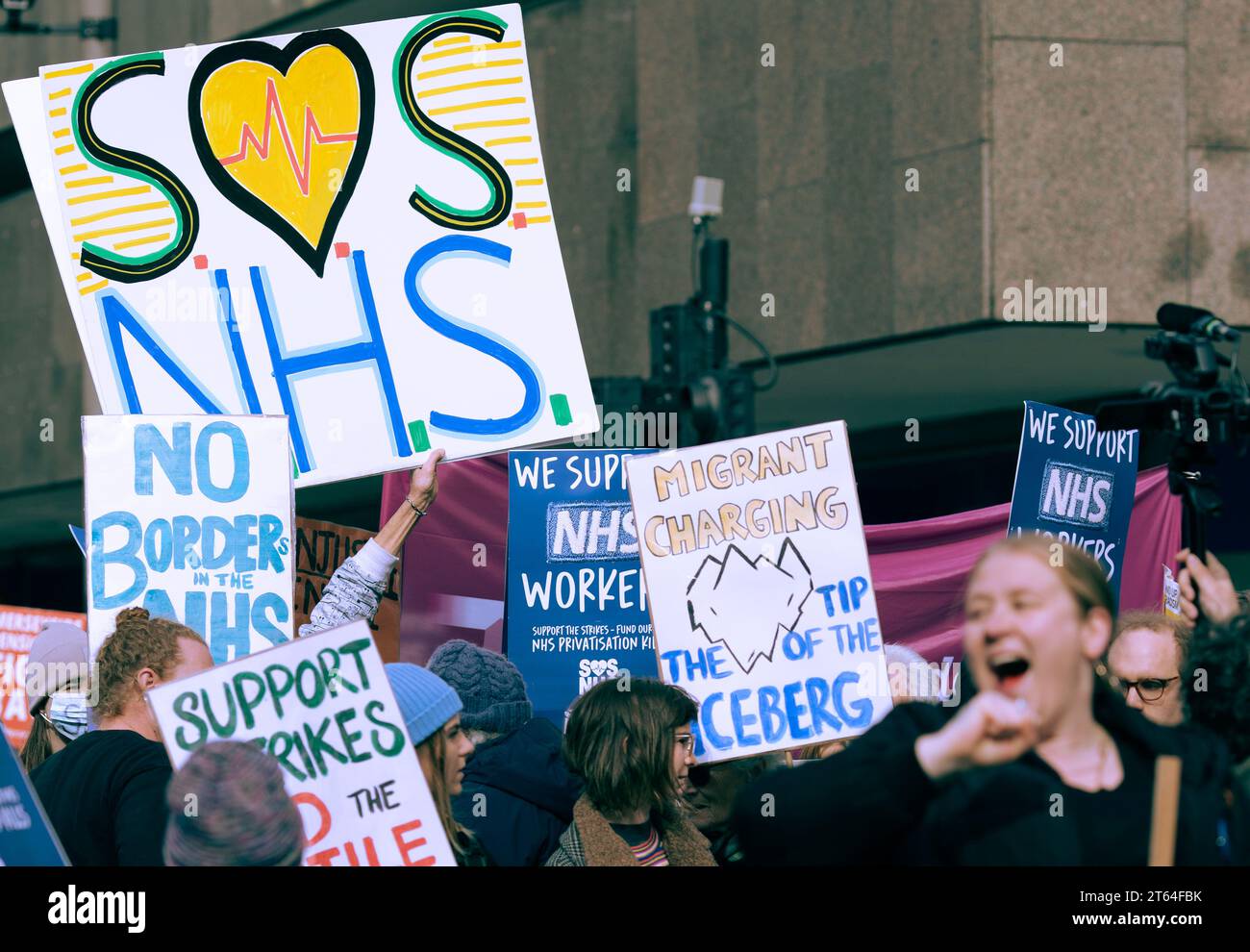 Participants gather and march during the SOS NHS demonstration in ...