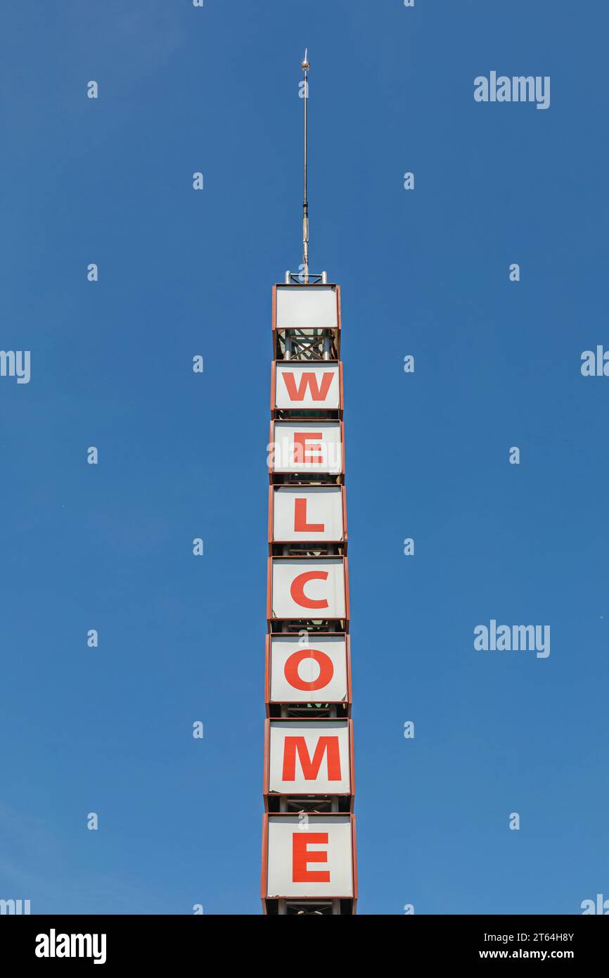 Welcome Message at Tall Column With Spire Lightning Rod Stock Photo - Alamy