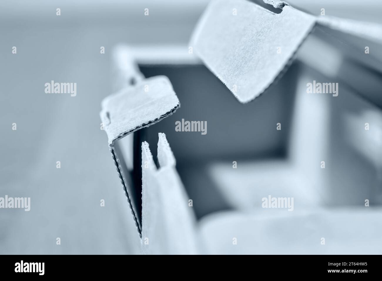 Small empty blue cardboad box ,open package Stock Photo - Alamy