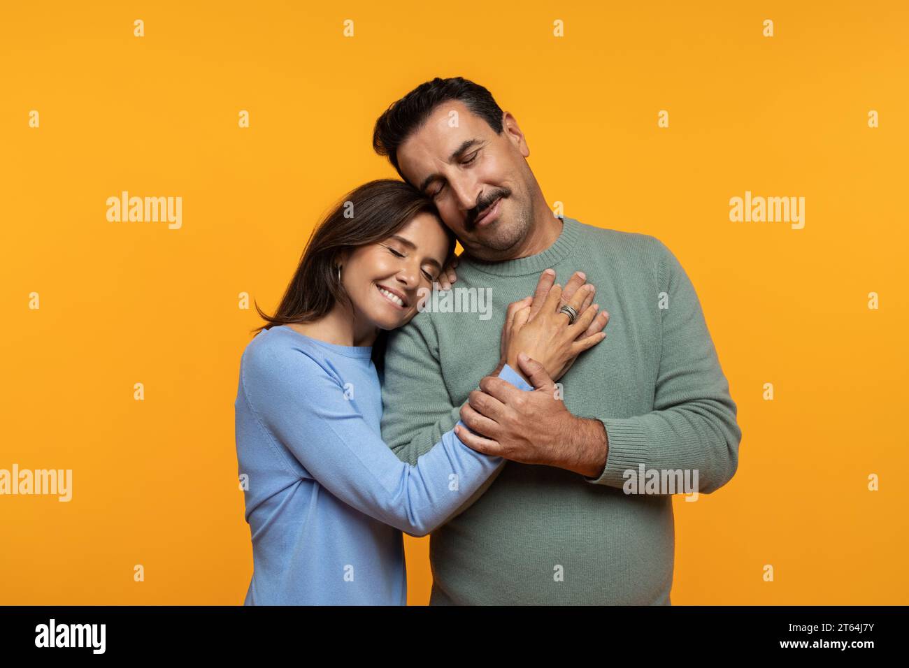 Smiling calm senior caucasian man and woman hug, with closed eyes Stock ...