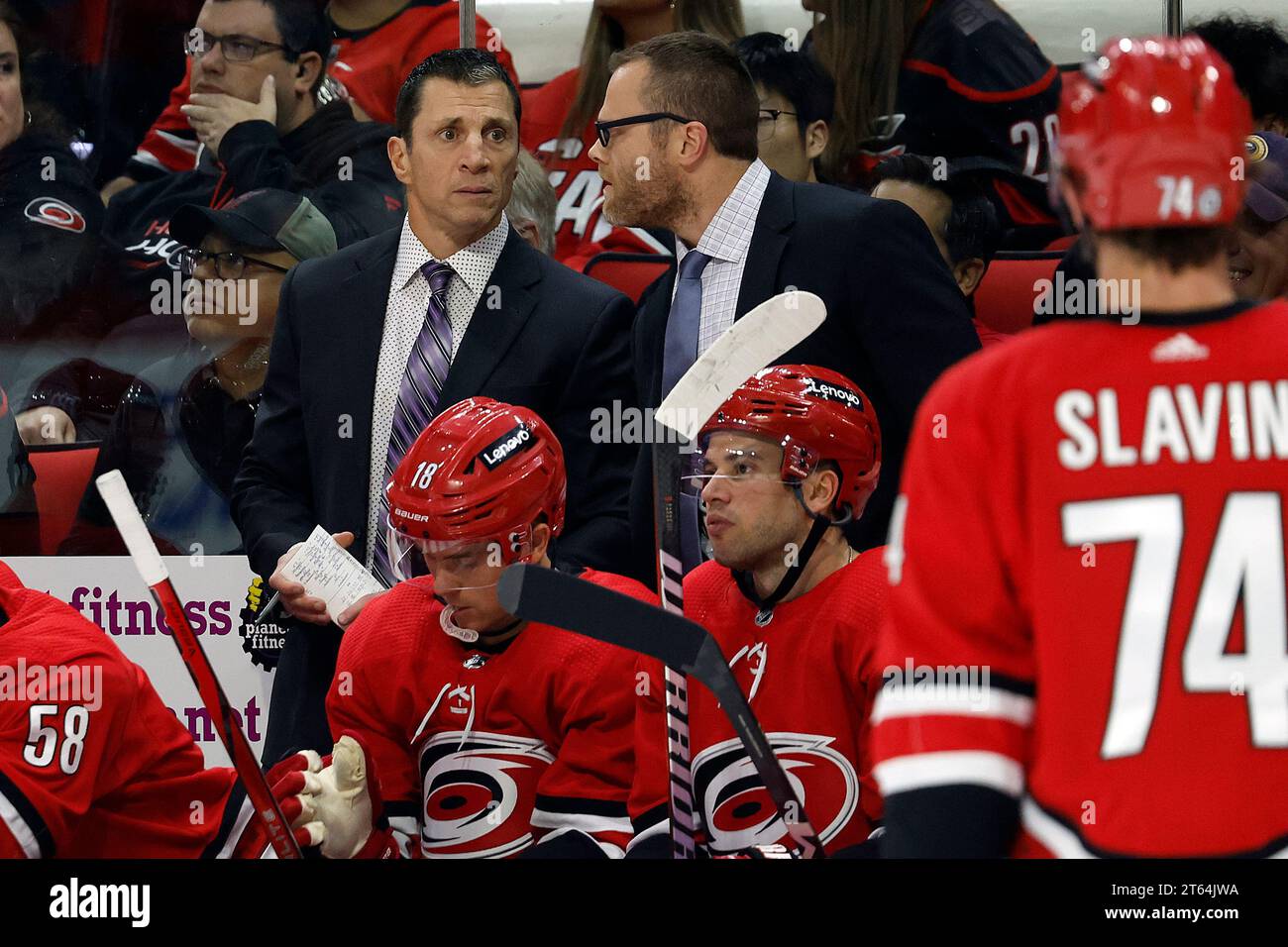 Carolina Hurricanes head coach Rod Brind'Amour, left, speaks with ...