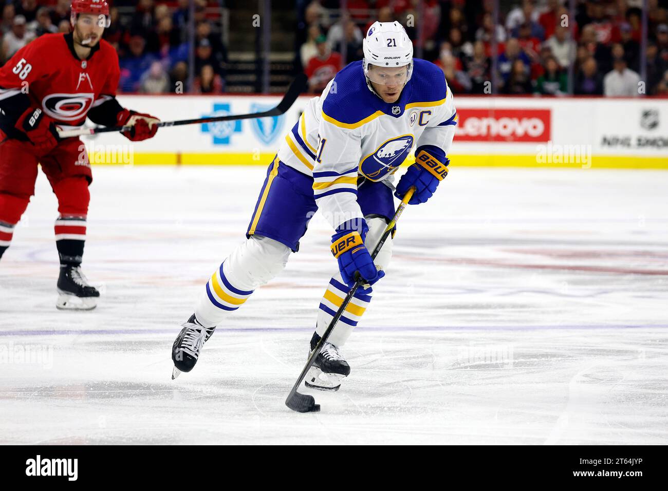 Buffalo Sabres' Kyle Okposo (21) skates away from Carolina Hurricanes ...