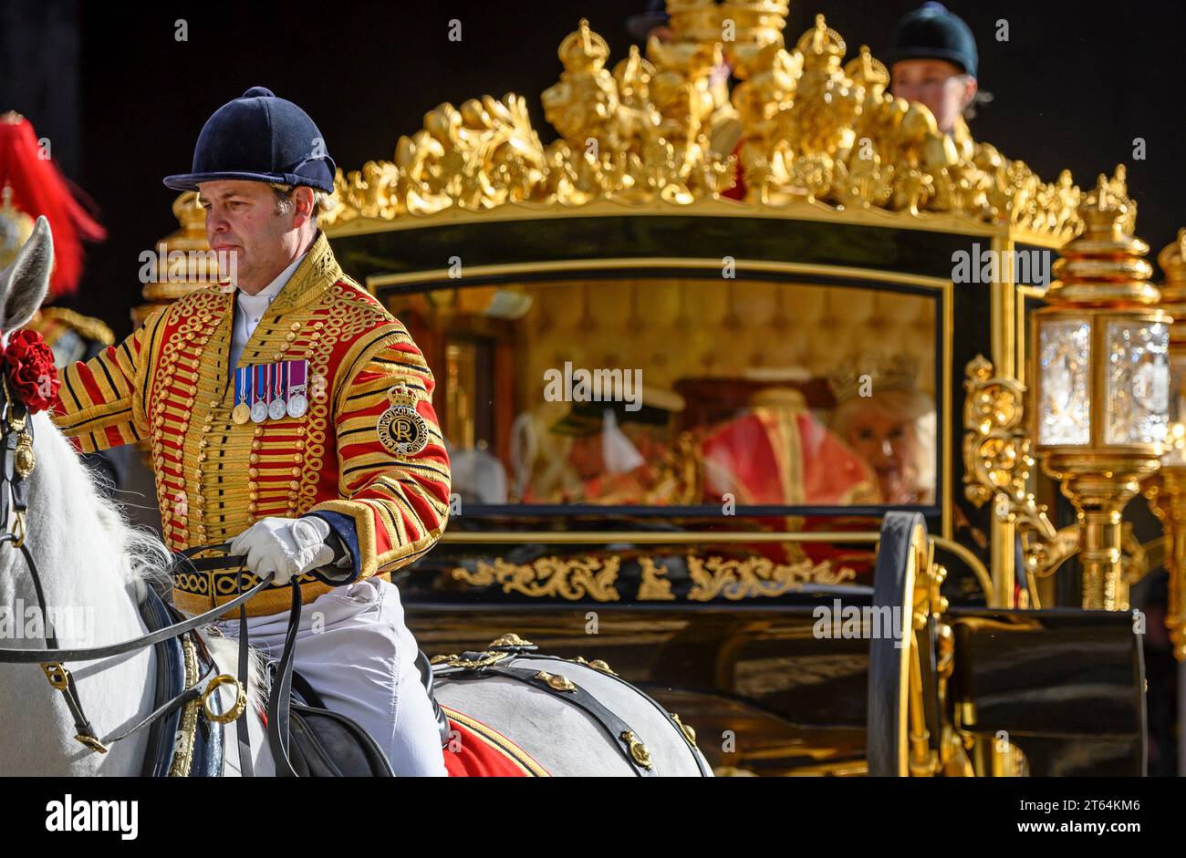 Postillion in full State livery leading King Charles III and Queen ...