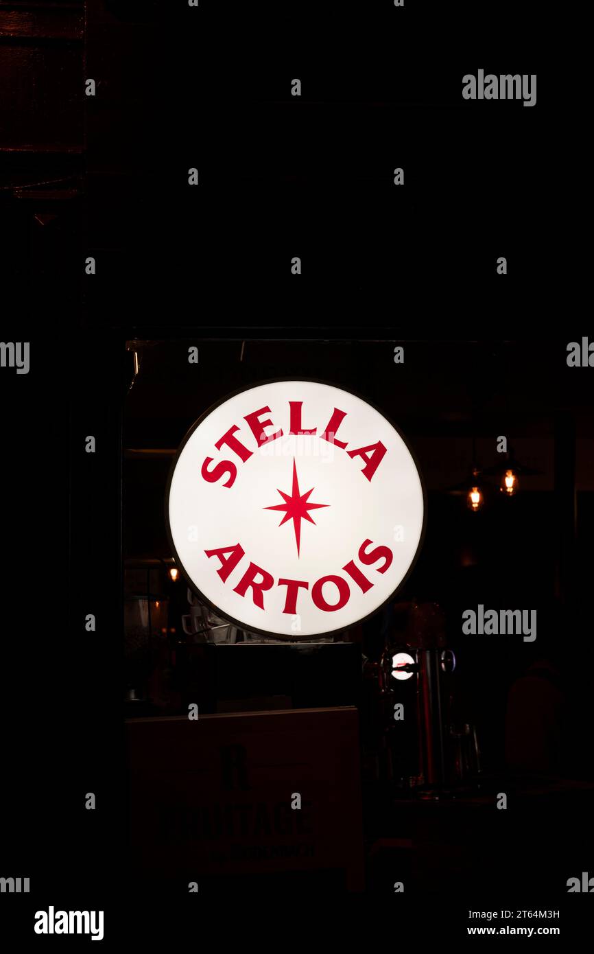 Stella Artois sign in pub window at night, Lincoln City, Lincolnshire ...