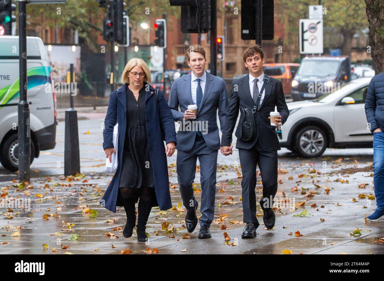 London, England, UK. 8th Nov, 2023. DUSTIN LANCE BLACK (centre) arrives ...