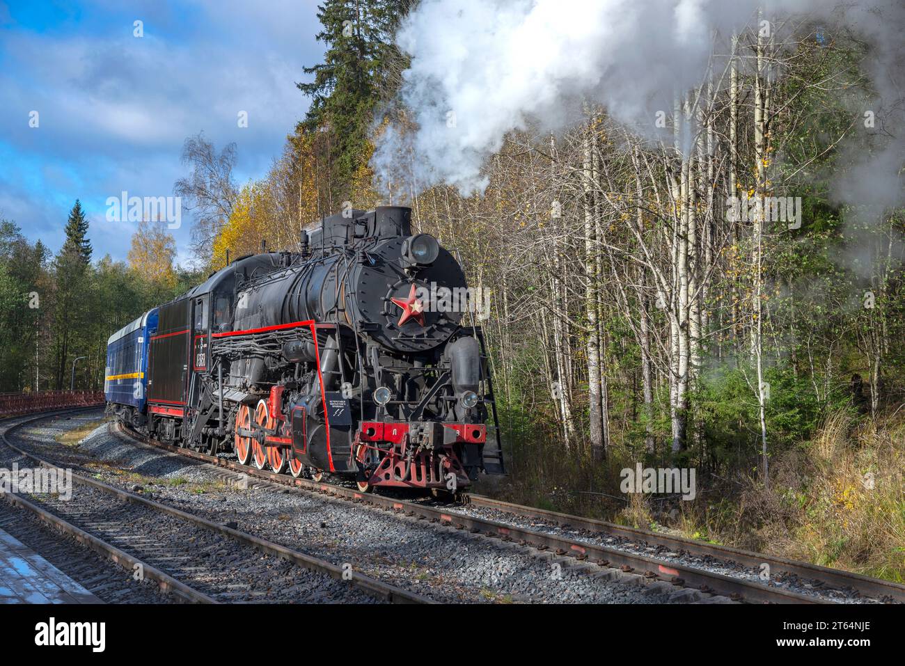 RUSKEALA, RUSSIA - OCTOBER 09, 2022: An old steam locomotive with the ...