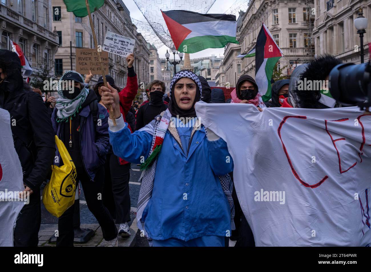 Thousands march through Central London in protest at military action by ...