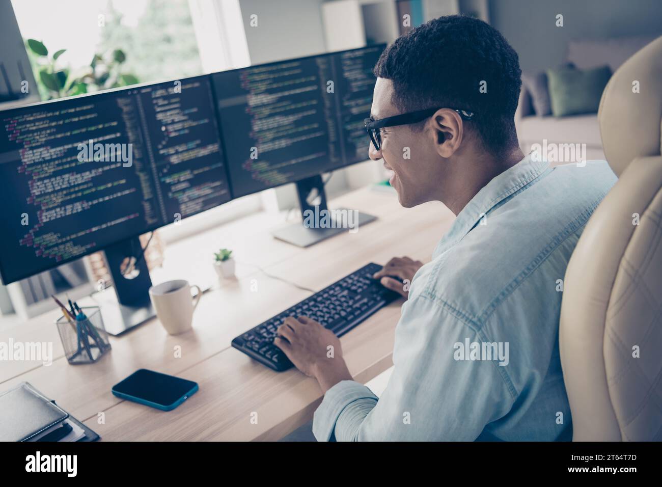 Side profile shot of busy man it startuper creating new nft collection coding computer typing ...