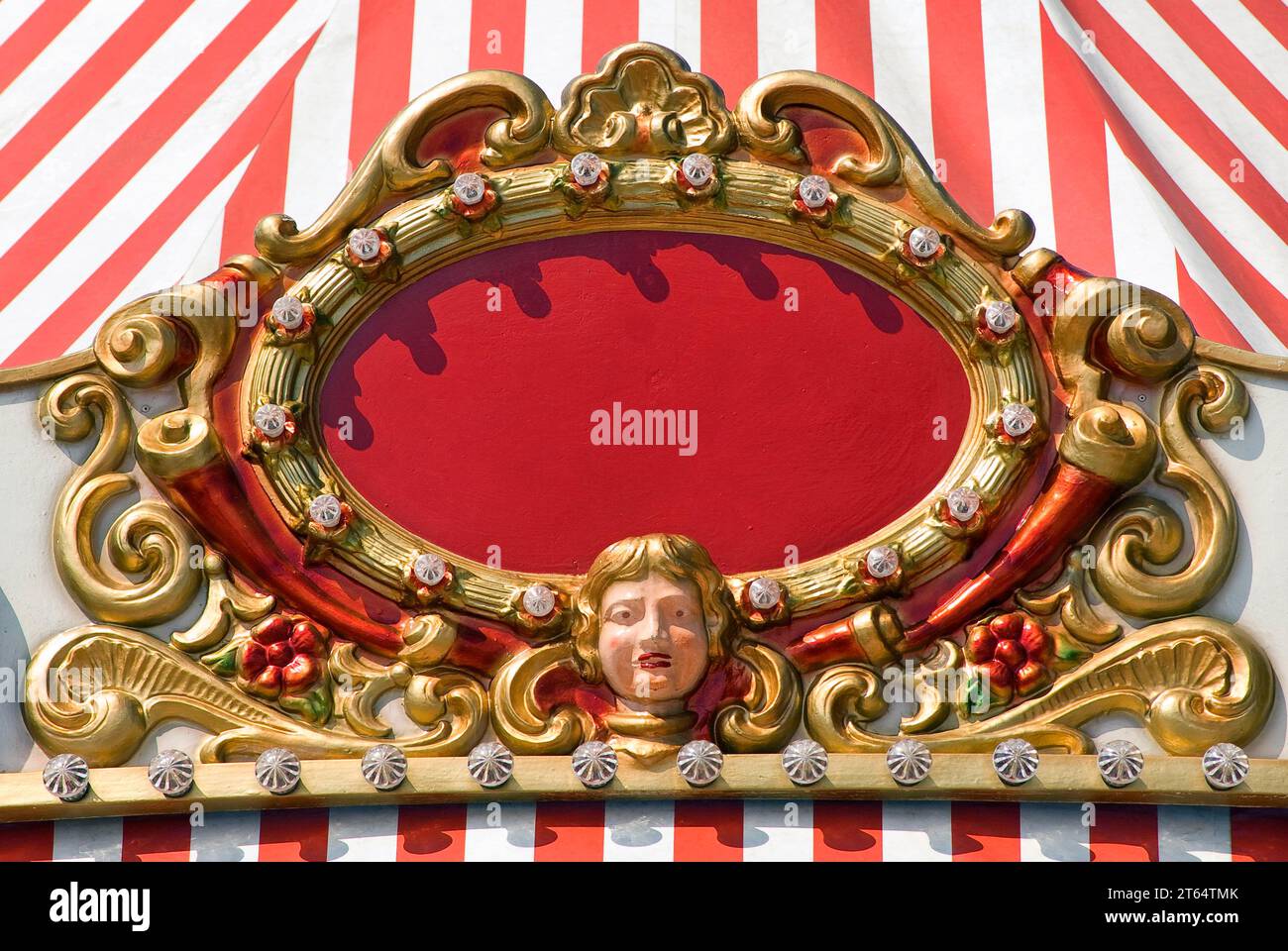 Detail from the roof of a fairground carousel, fair, carousel, circus ...