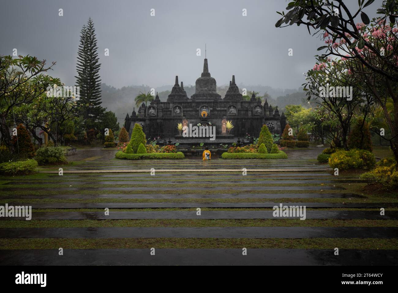 A Buddhist temple in the evening in the rain. The Brahmavihara Arama ...